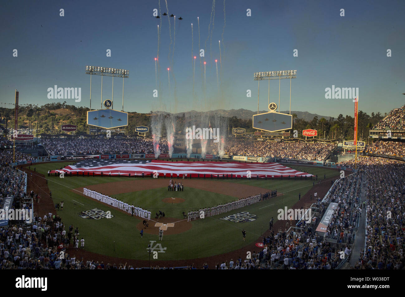 Jets fly over Dodger Stadium Stadium during the National Anthem before ...