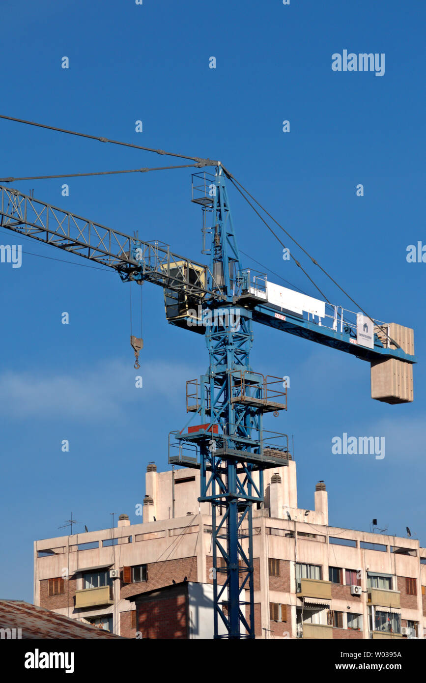 Blue construction crane in Mendoza, Argentina Stock Photo - Alamy