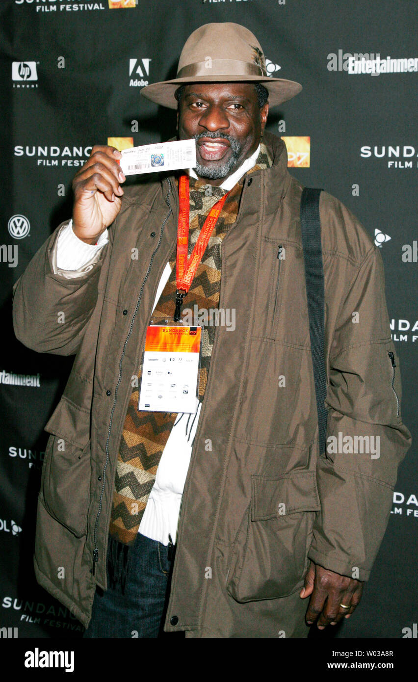 Actor Afemo Omilami flashes his movie ticket before a screening of the ...