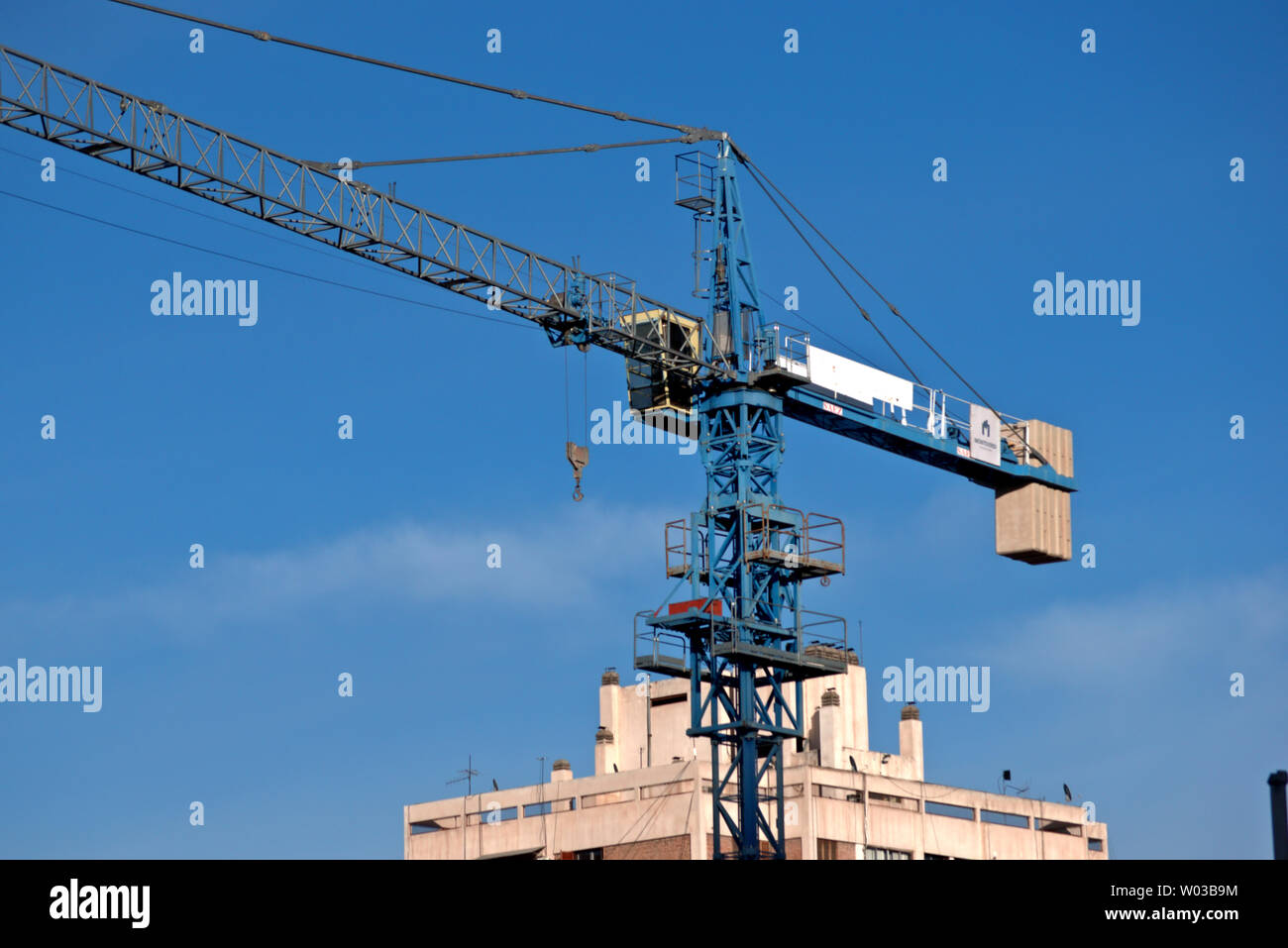 Blue construction crane in Mendoza, Argentina Stock Photo - Alamy