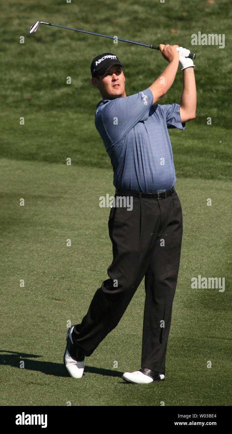 Tournament leader Jeff Quinney of Scottsdale, Arizona watches his ...