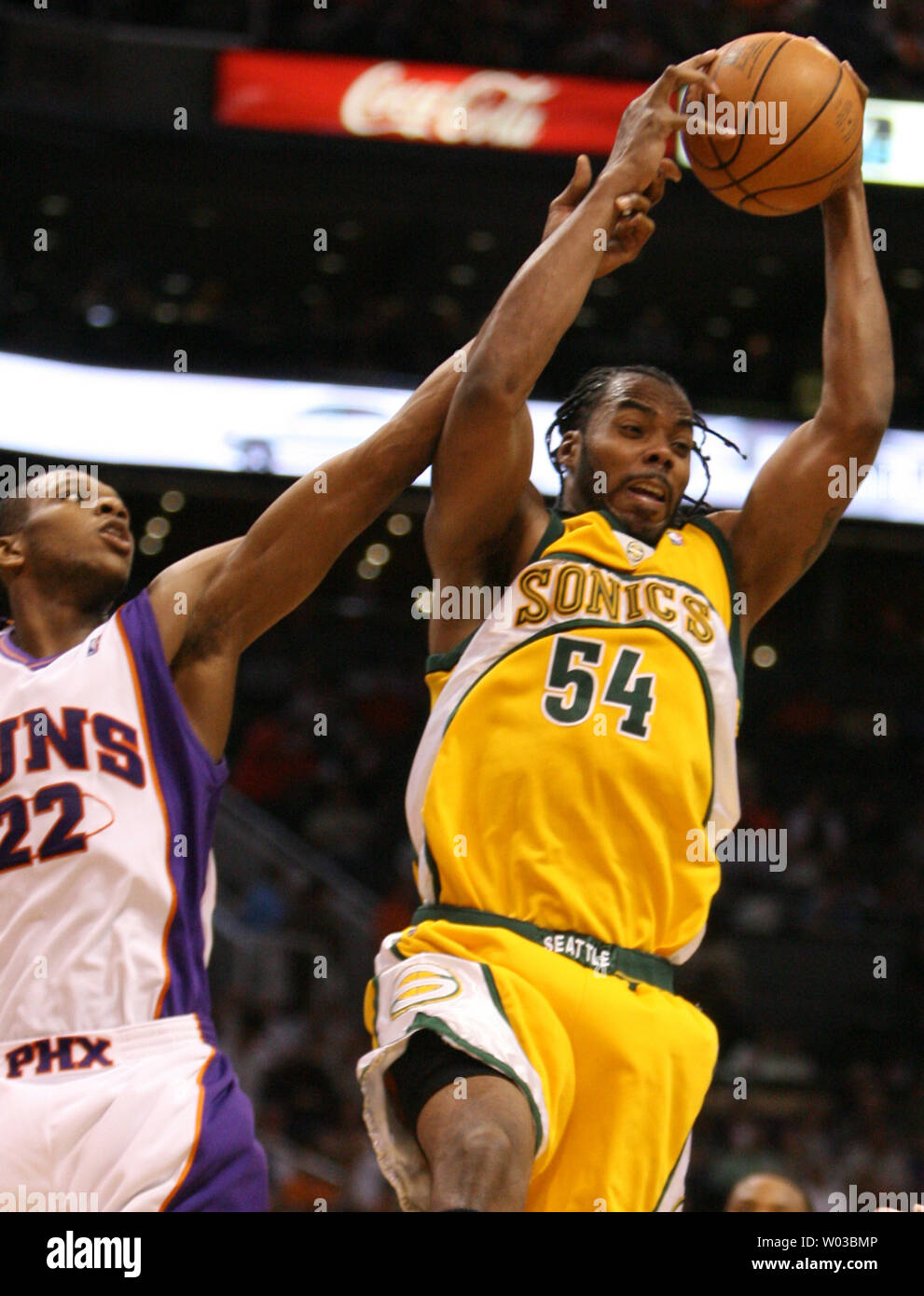 Seattle SuperSonics forward Chris Wilcox (54) brings down a rebound ...