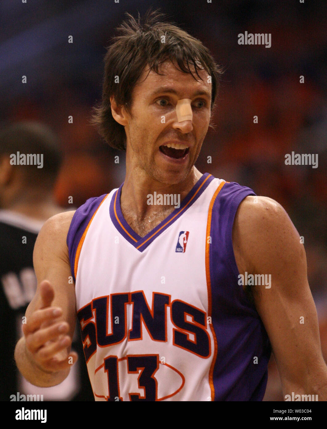 Phoenix Suns guard Steve Nash is bandaged from a gash he sustained in ...