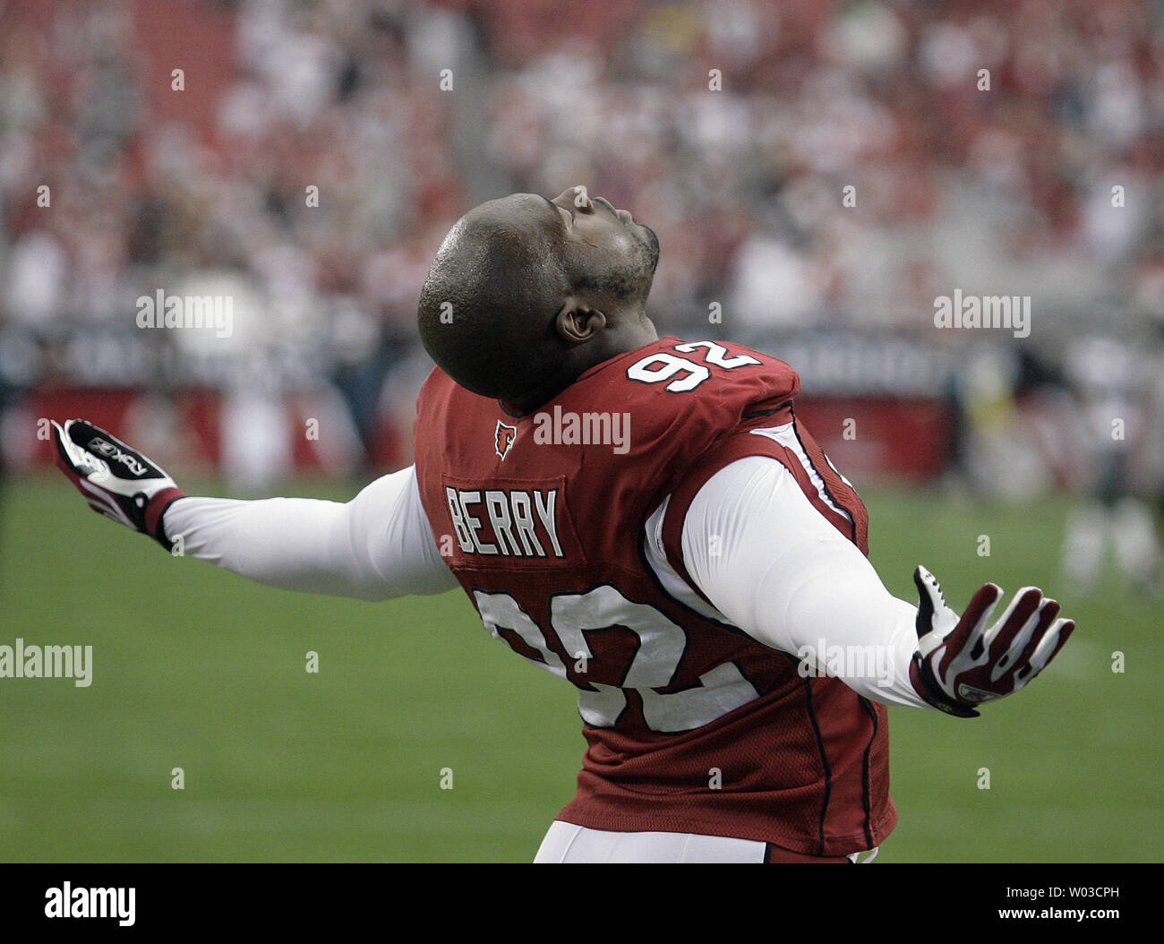 Arizona Cardinals defensive end Bertrand Berry takes in the atmosphere ...
