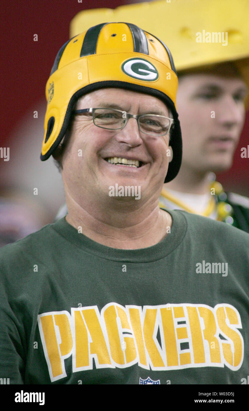 A Green Bay Packers fan is all smiles after the Packers defeated the ...