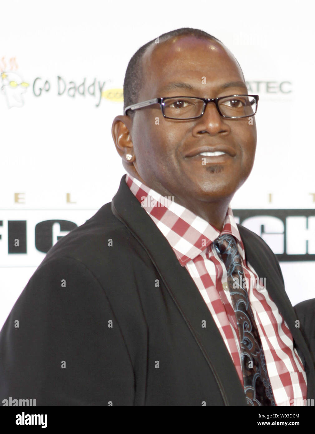American Idol winner Randy Jackson poses on the red carpet at the ...