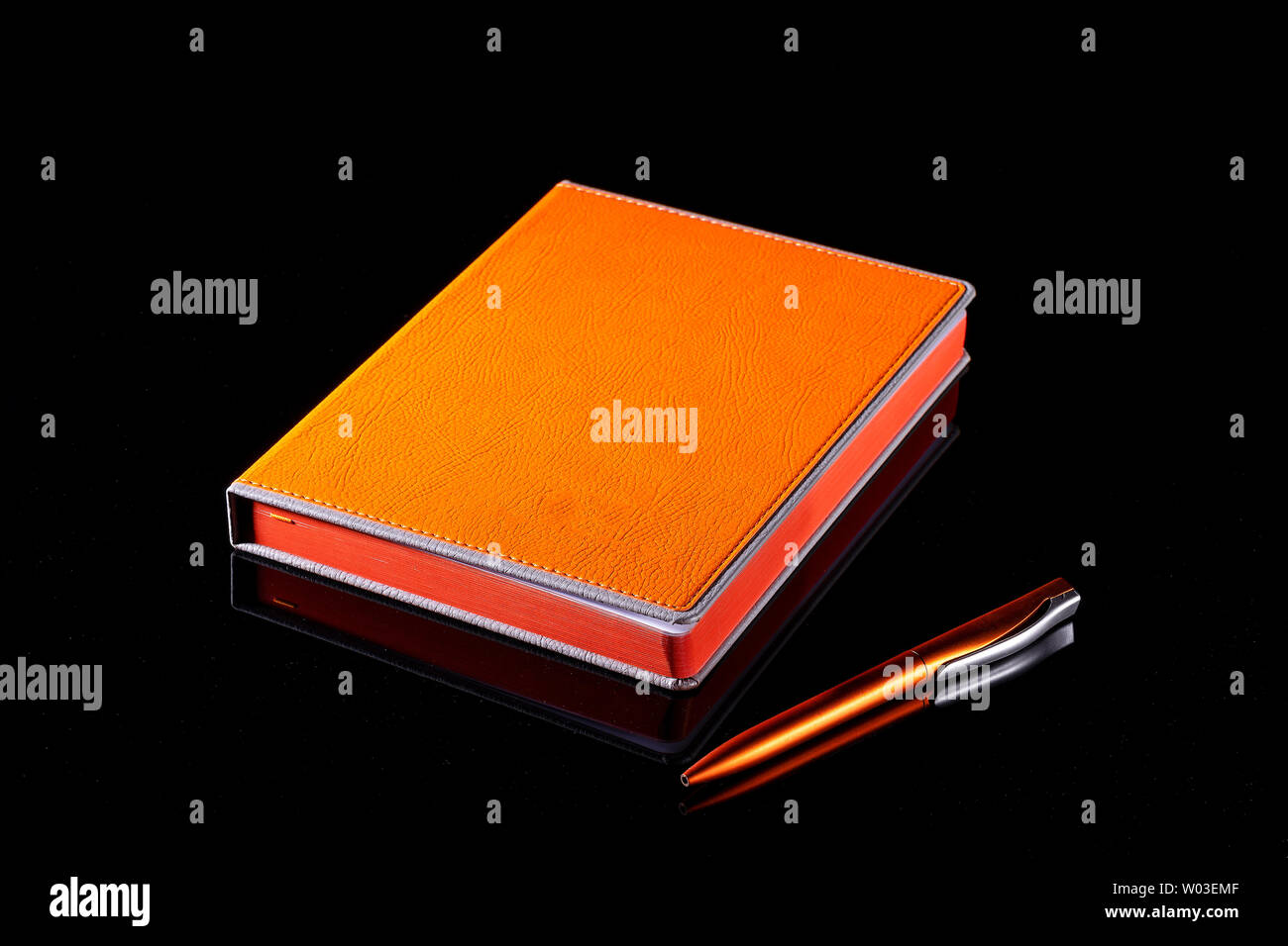 Orange spiral notebook hi-res stock photography and images - Alamy
