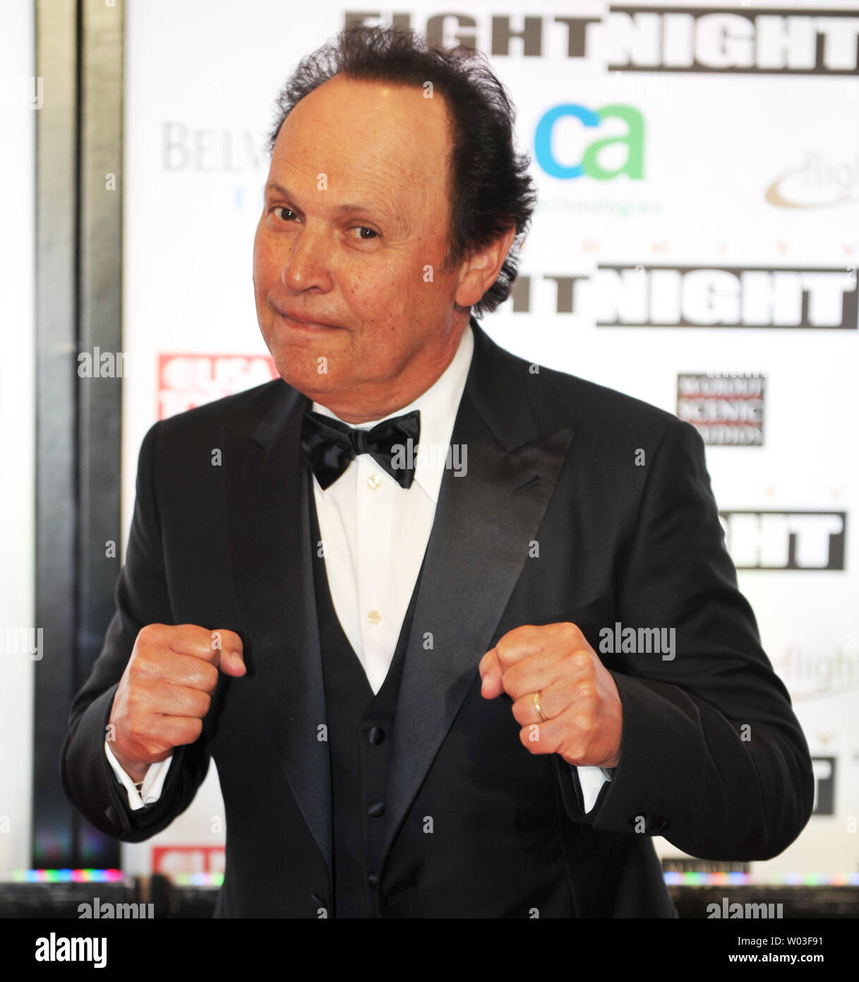 Billy Crystal show his boxing form on the red carpet at the Muhammad ...