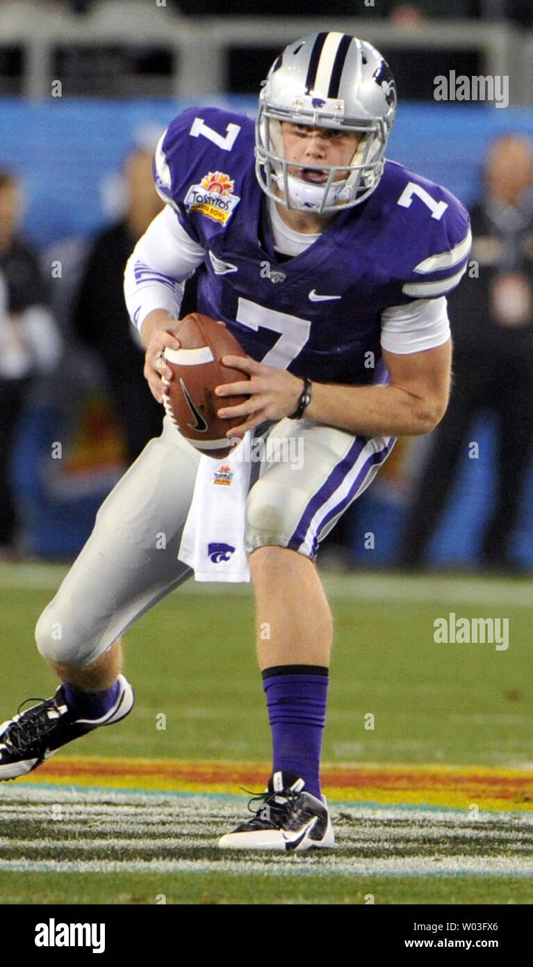 Kansas State Wildcats quarterback Collin Klein looks for running room ...