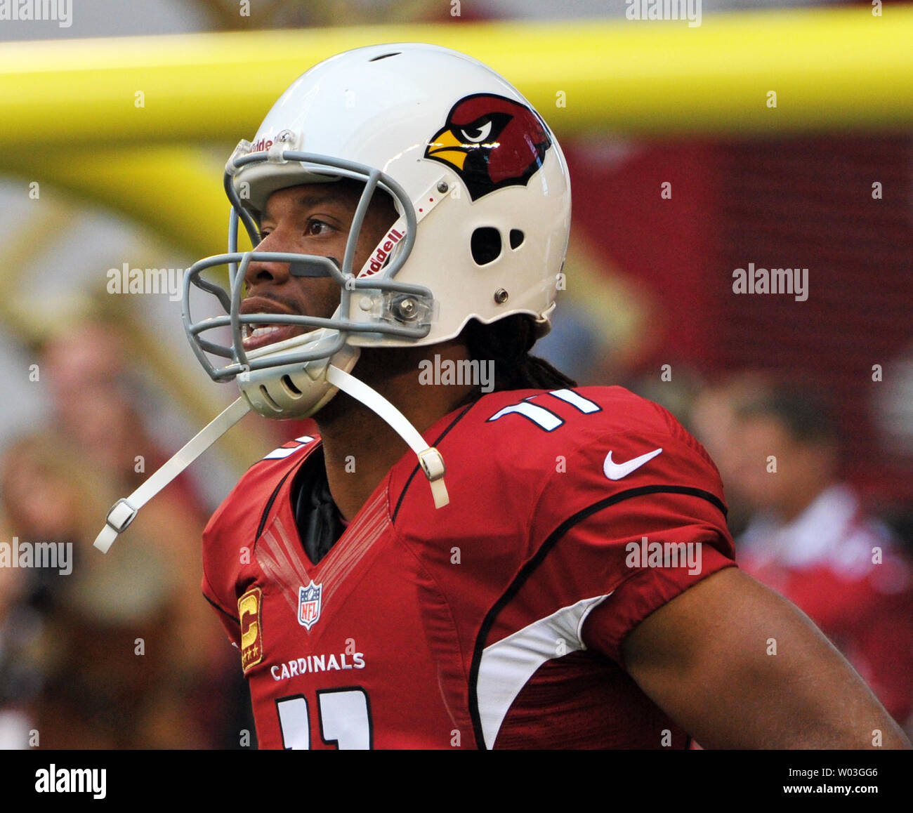 Arizona Cardinals receiver Larry Fitzgerald waits for his tier to catch ...