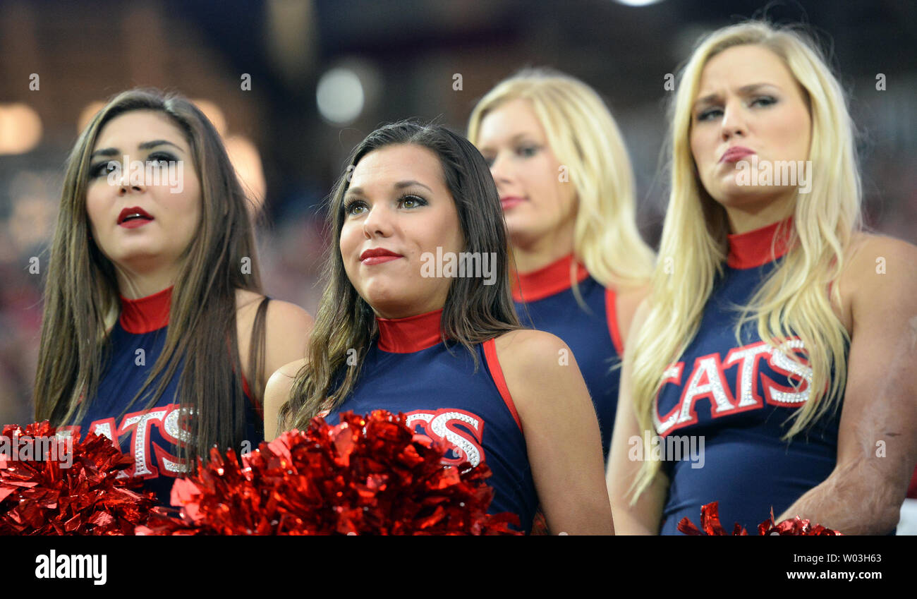 Arizona Wildcats cheerleaders don't look overly happy as the Wildcats ...