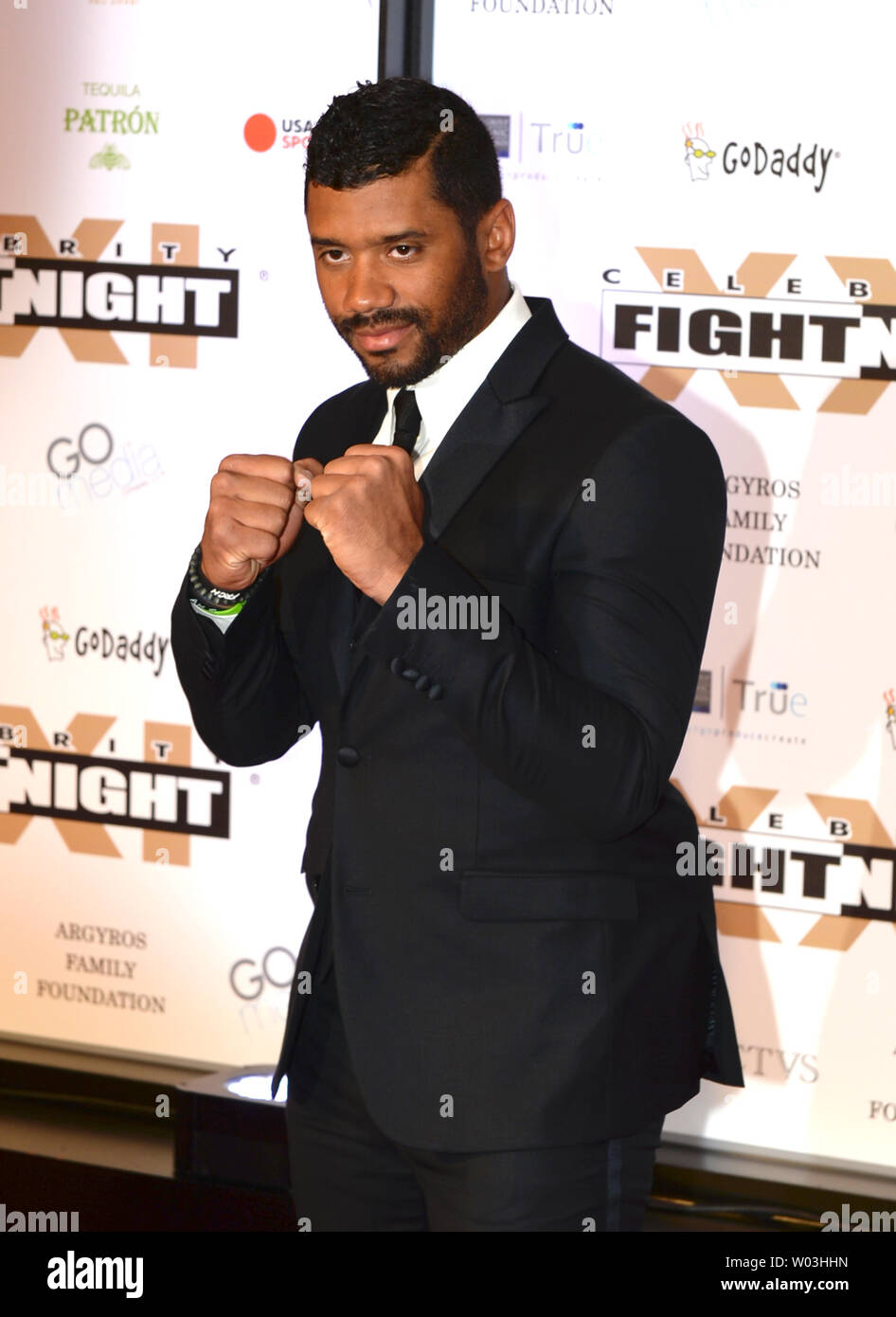 Seattle Seahawks quarterback Russell Wilson strikes a boxing stance as ...