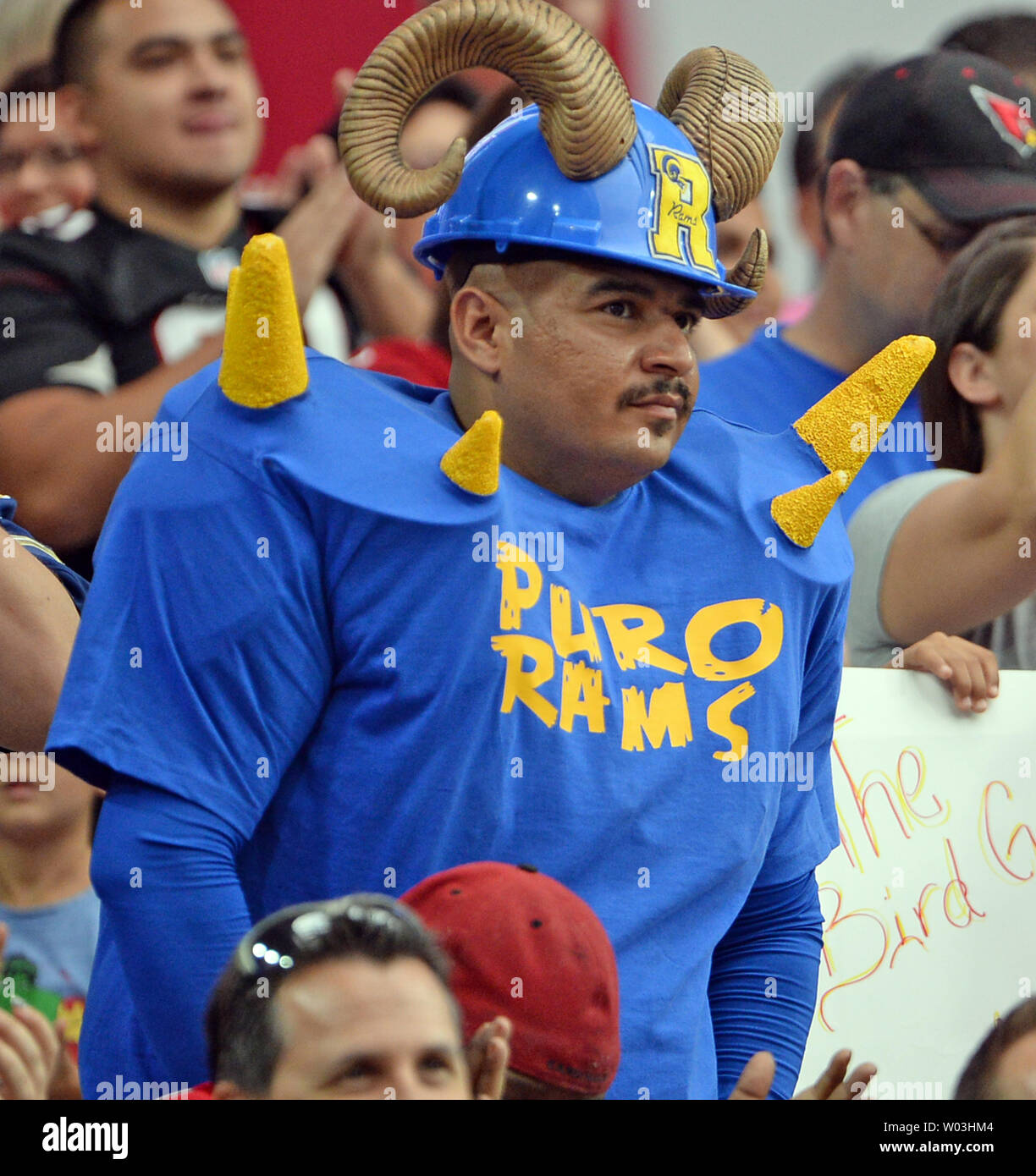 A Saint Louis Rams fan watches the action in the first half of the Rams ...