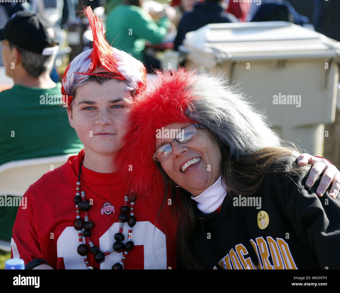 Ohio State fans huddle together in the cold temperatures before the ...