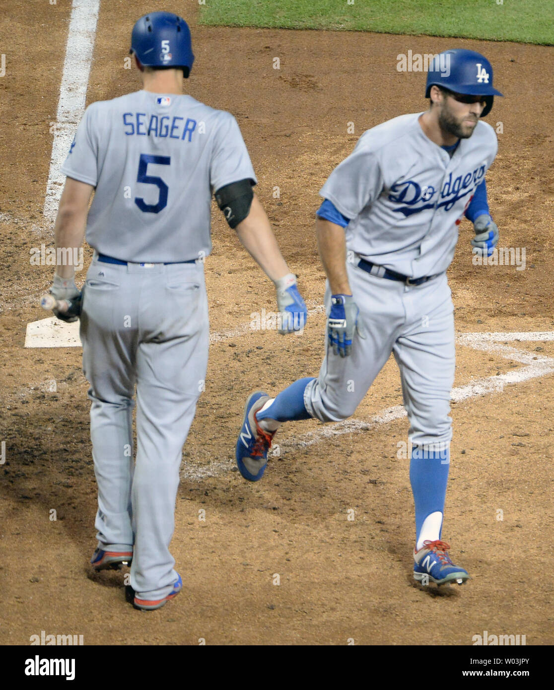 Los Angeles Dodgers Chris Taylor (R) is congratulated by Corey Seager after Taylor hit a home ...