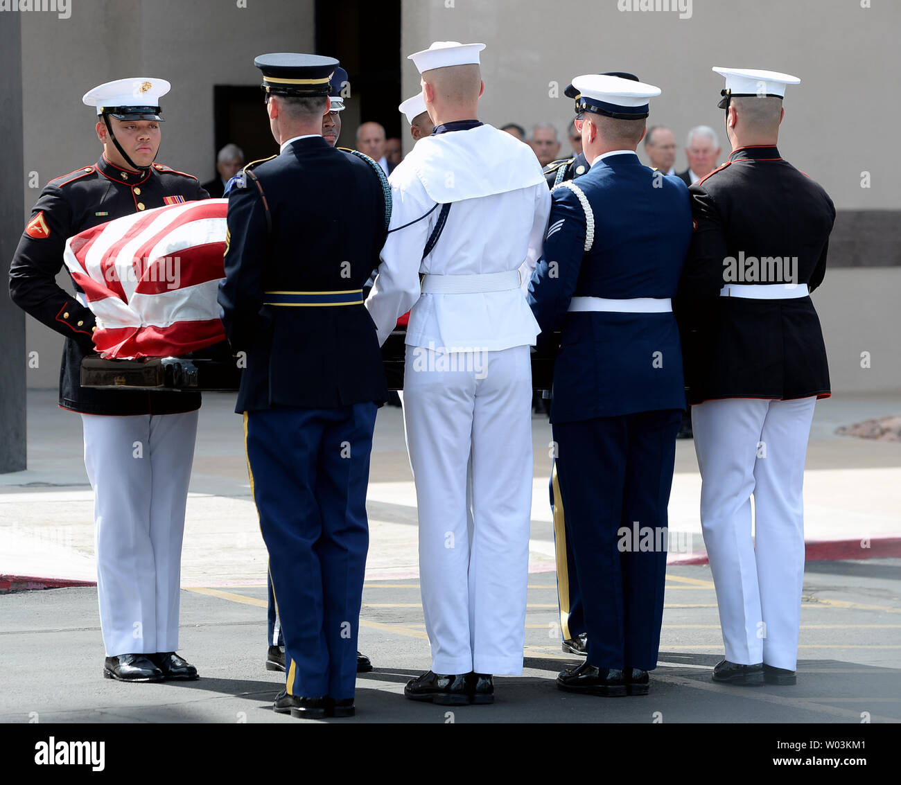 The flag draped casket of Sen. John McCain arrives at North Phoenix ...