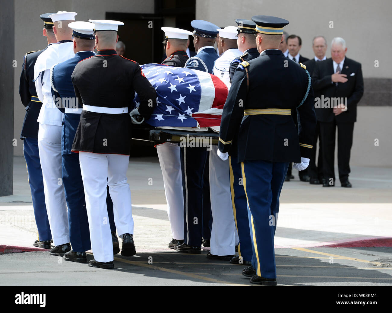 The flag draped casket of Sen. John McCain is moved into North Phoenix ...