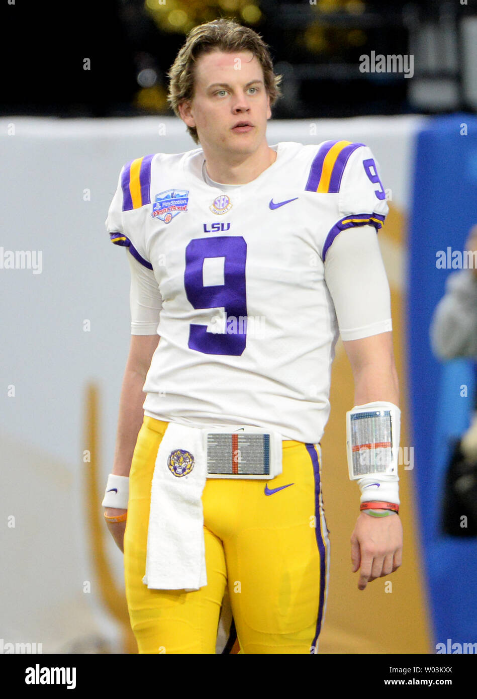 Louisiana State University Tigers quarterback Joe Burrow waits his turn ...