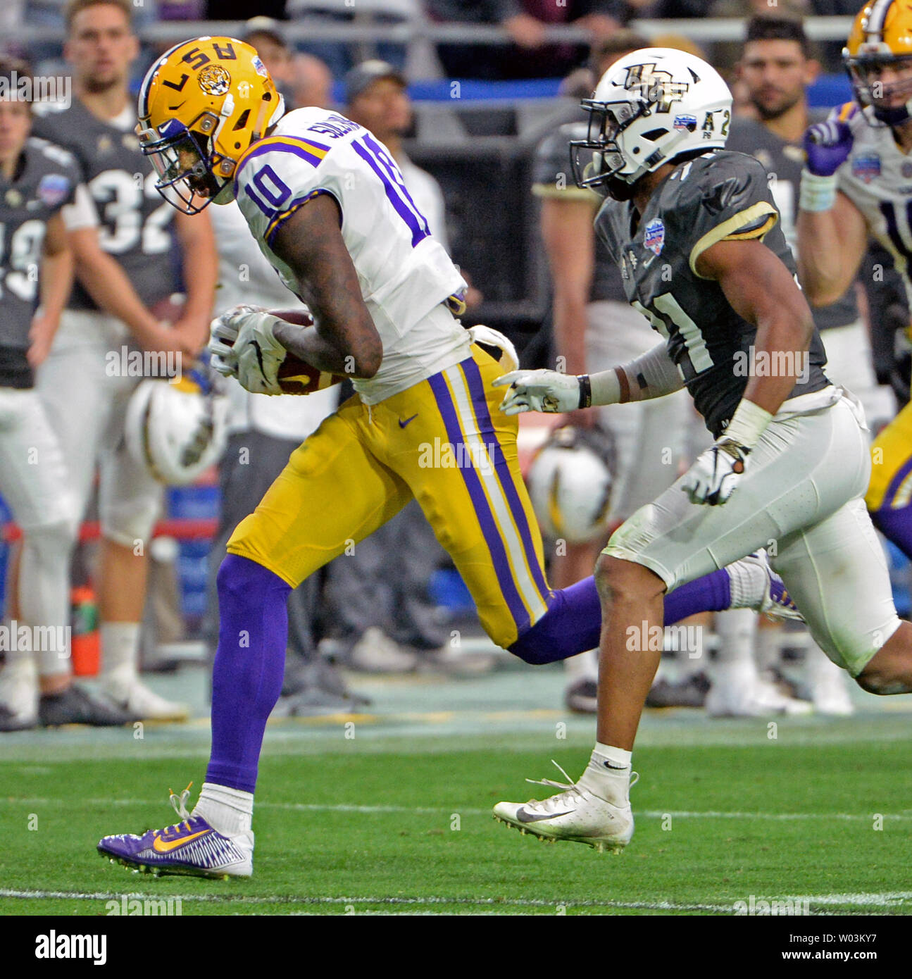 Louisiana State University Tigers Stephen Sullivan.(L) picks up a first ...