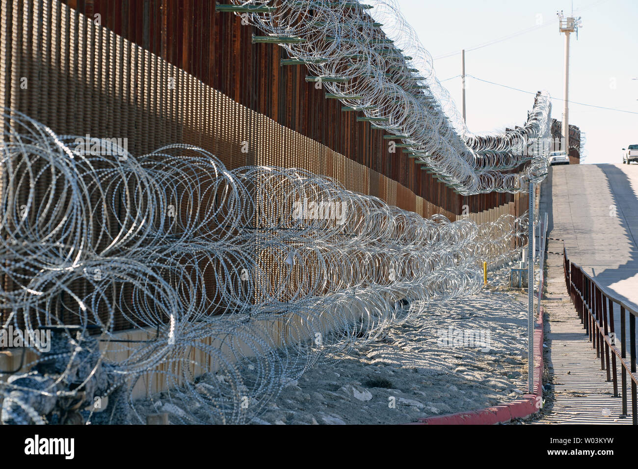 Barbed wire has been placed along the fence of United States-Mexico ...