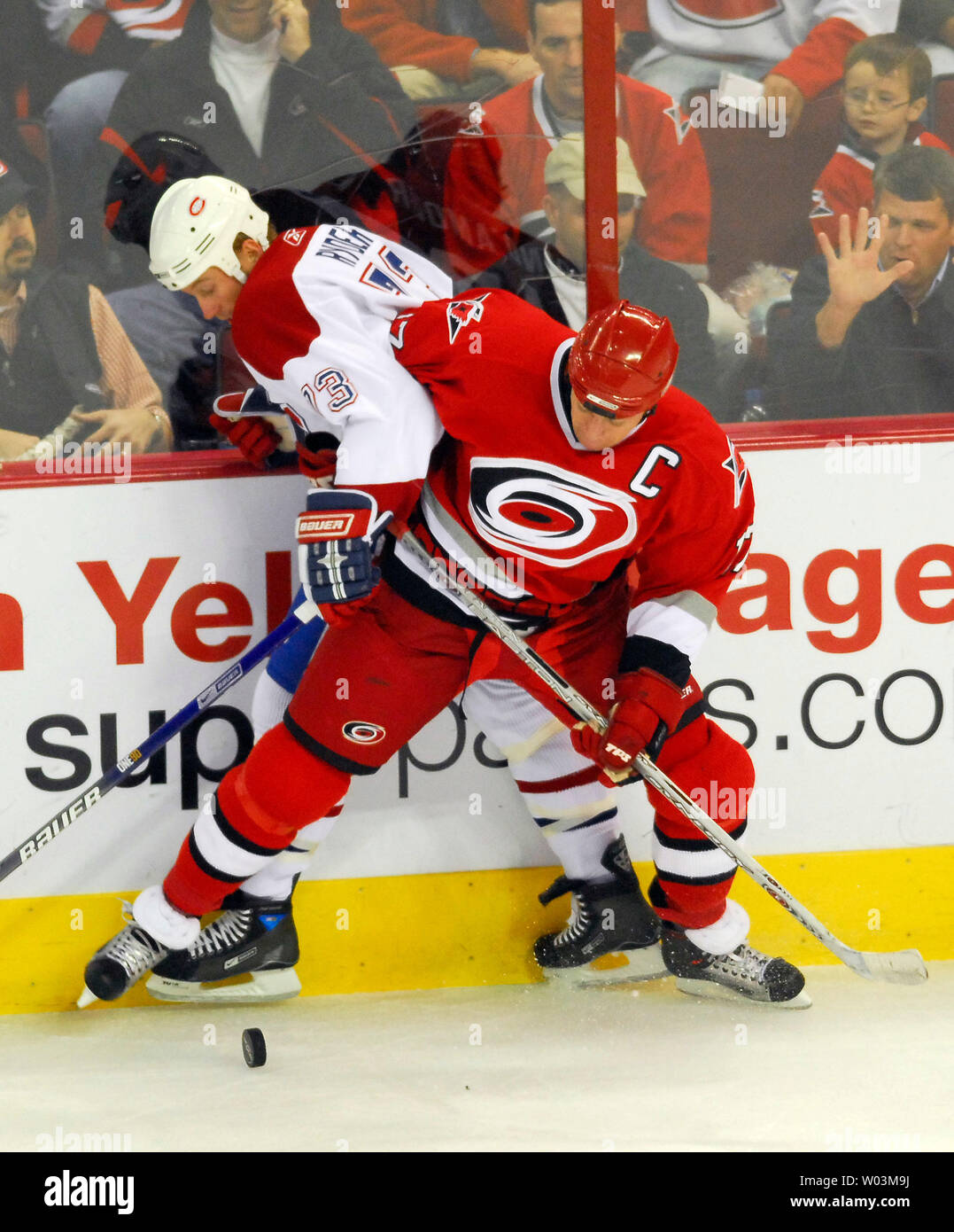 Montreal Canadiens' Michael Ryder (73) battles Carolina Hurricanes' Rod ...