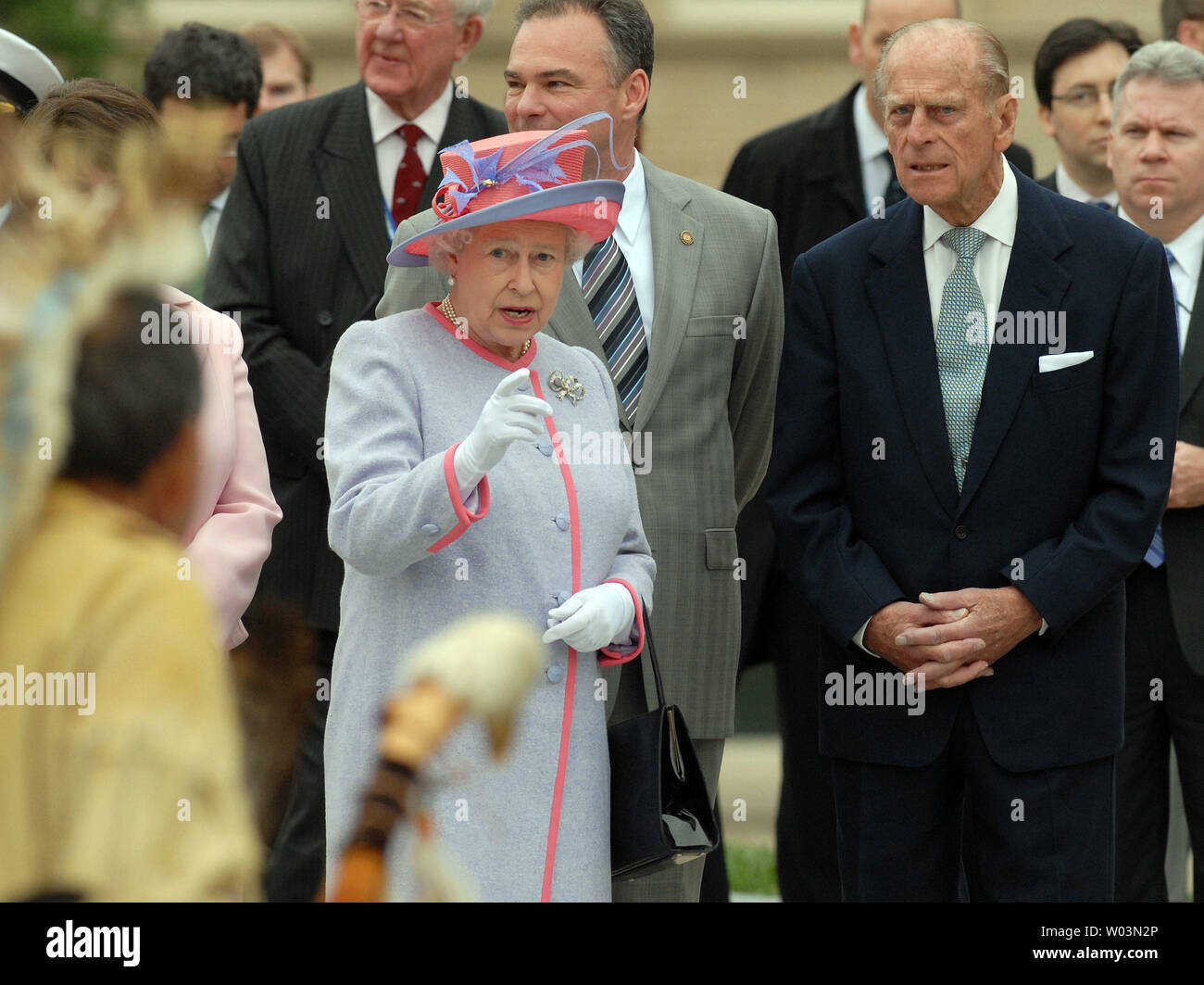 Britain's Queen Elizabeth II and her husband Prince Philip watch Native ...