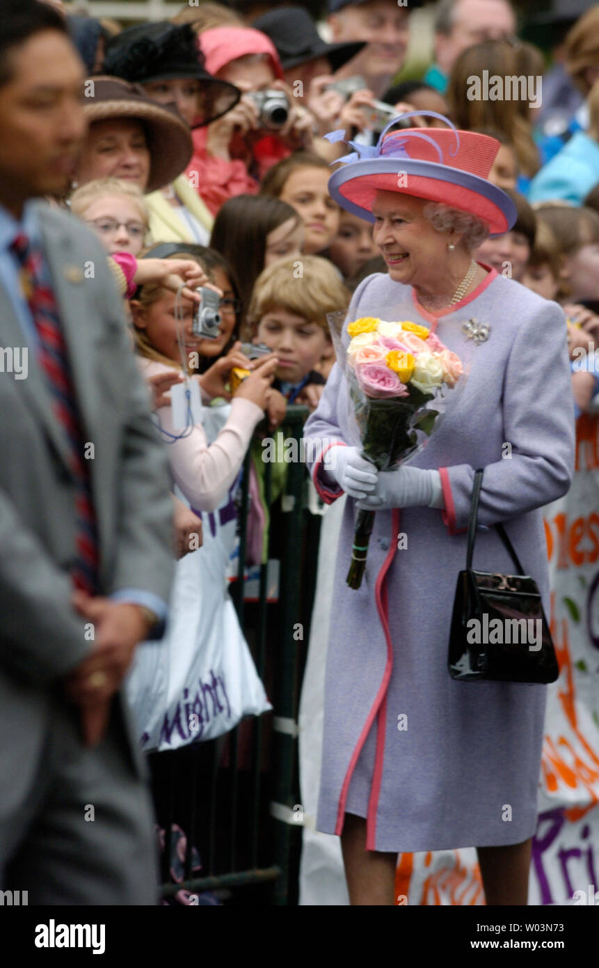 Britain's Queen Elizabeth II walks from the Governor's Mansion to to ...