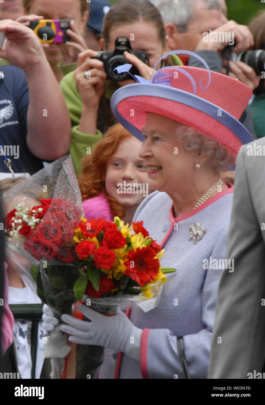 Britain's Queen Elizabeth II greets the public as she walks from the ...