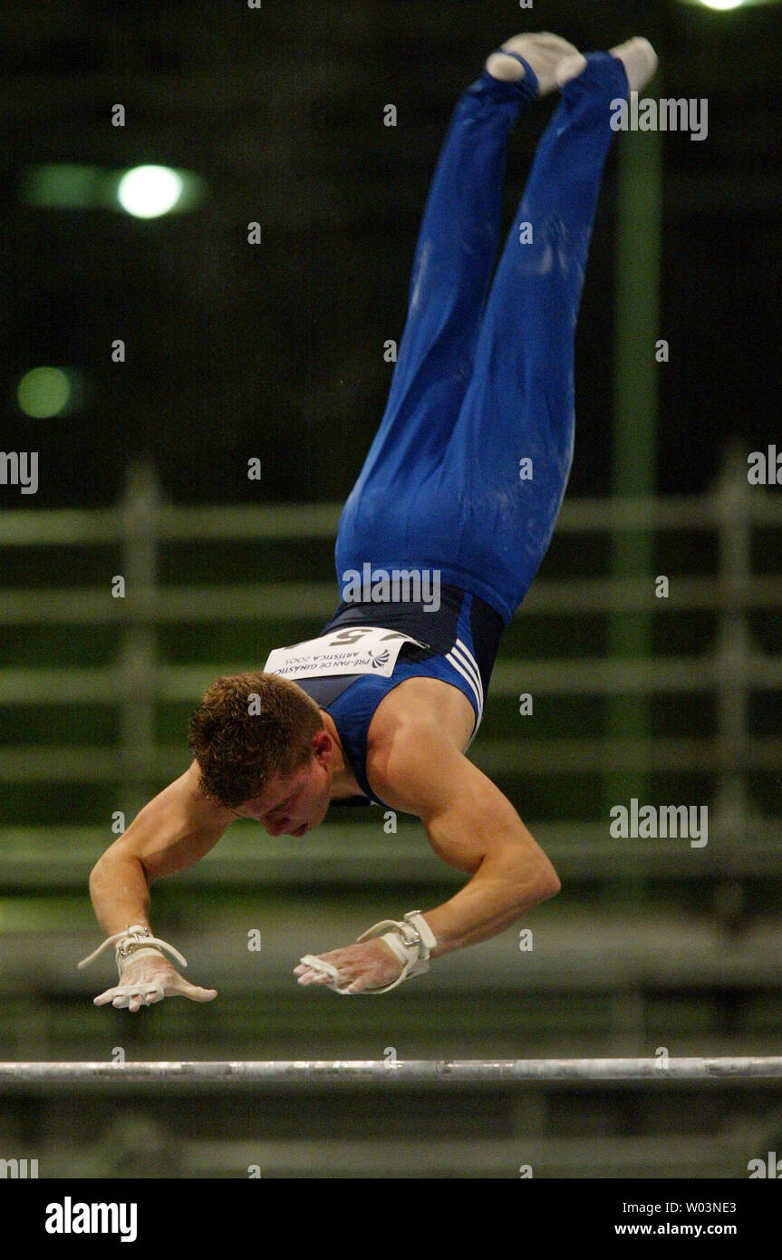 American gymnast Jonathan Horton performs a backward somersault release ...