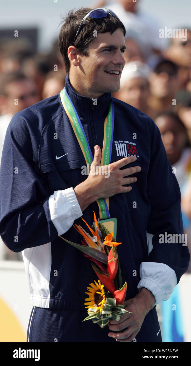 American triathlete Andy Potts has his national anthem played in his ...