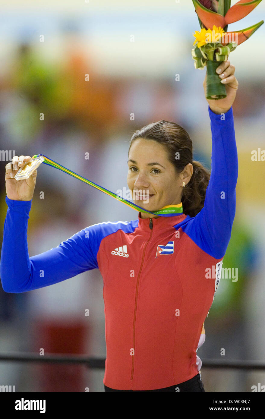 Cuba's Yoanka Gonzalez shows off her gold medal after winning the women ...
