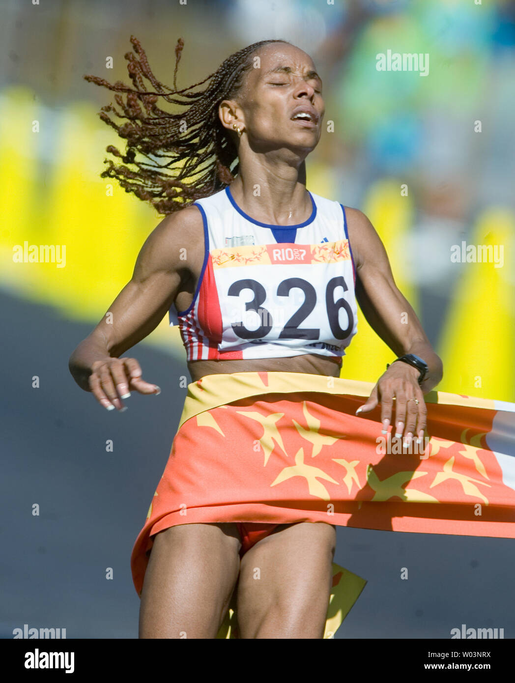 Cuba's Mariela Gonzalez crosses the finish line winning gold in women's ...