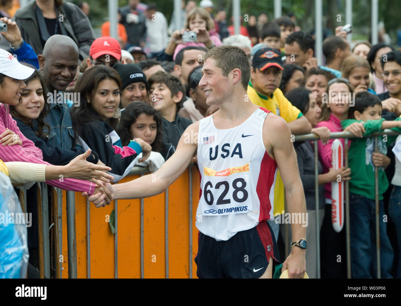 USA's Jacob Frey is congratulated by spectators after placing fourth ...
