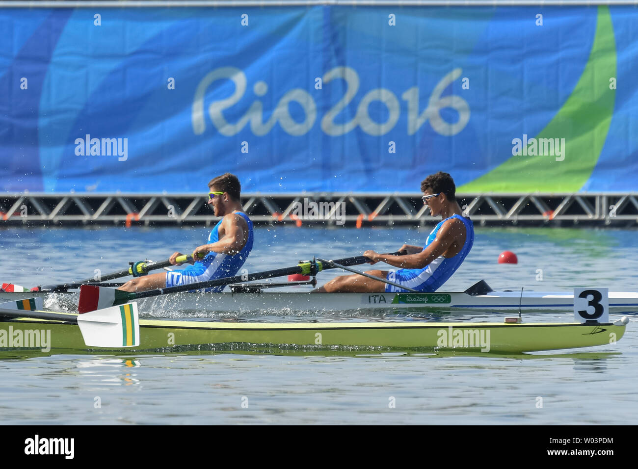 Francesco Fossi and Romano Battisti, of Italy, row their way to the ...