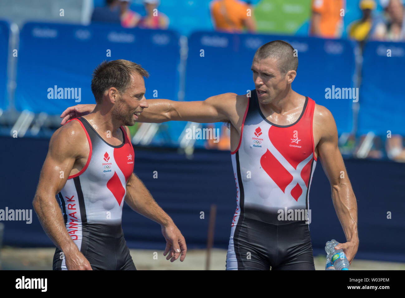 Mads Rasmussen and Rasmus Quist, of Denmark, embrace after winning the ...