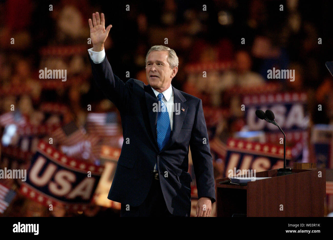President George W. Bush waves to the crowd prior to giving his ...