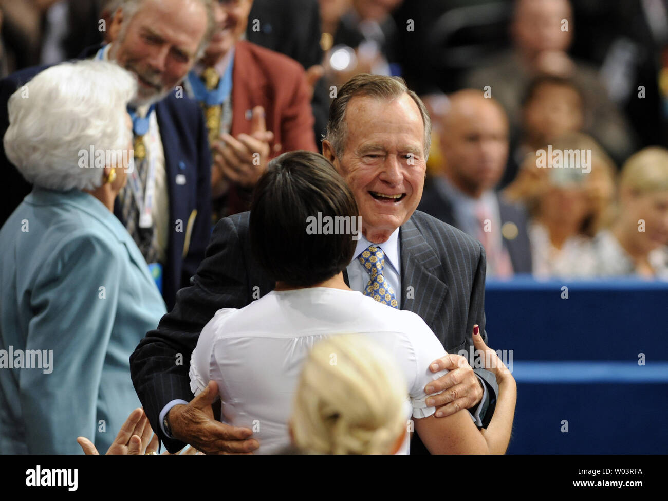 Former U.S. President George H.W. Bush hugs Navy SEAL and Medal of ...