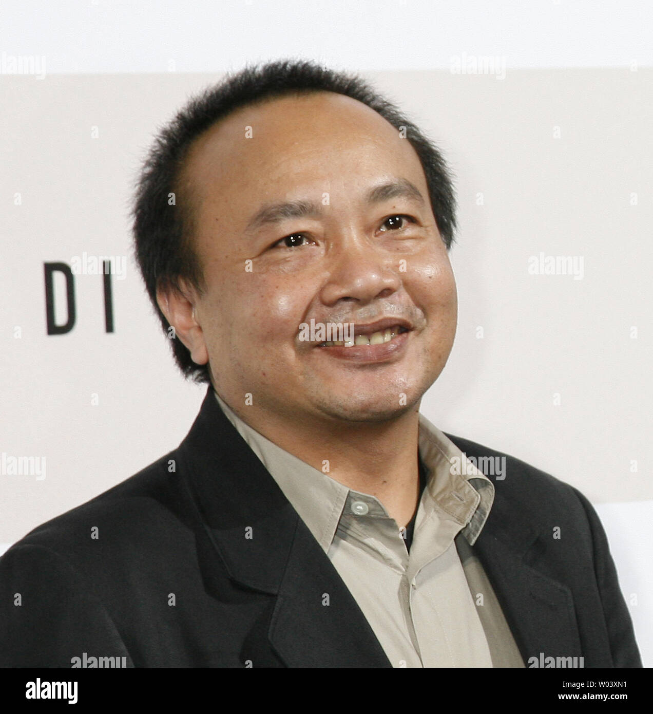 Director Rithy Panh arrives at a photocall for the film "Un barrage ...