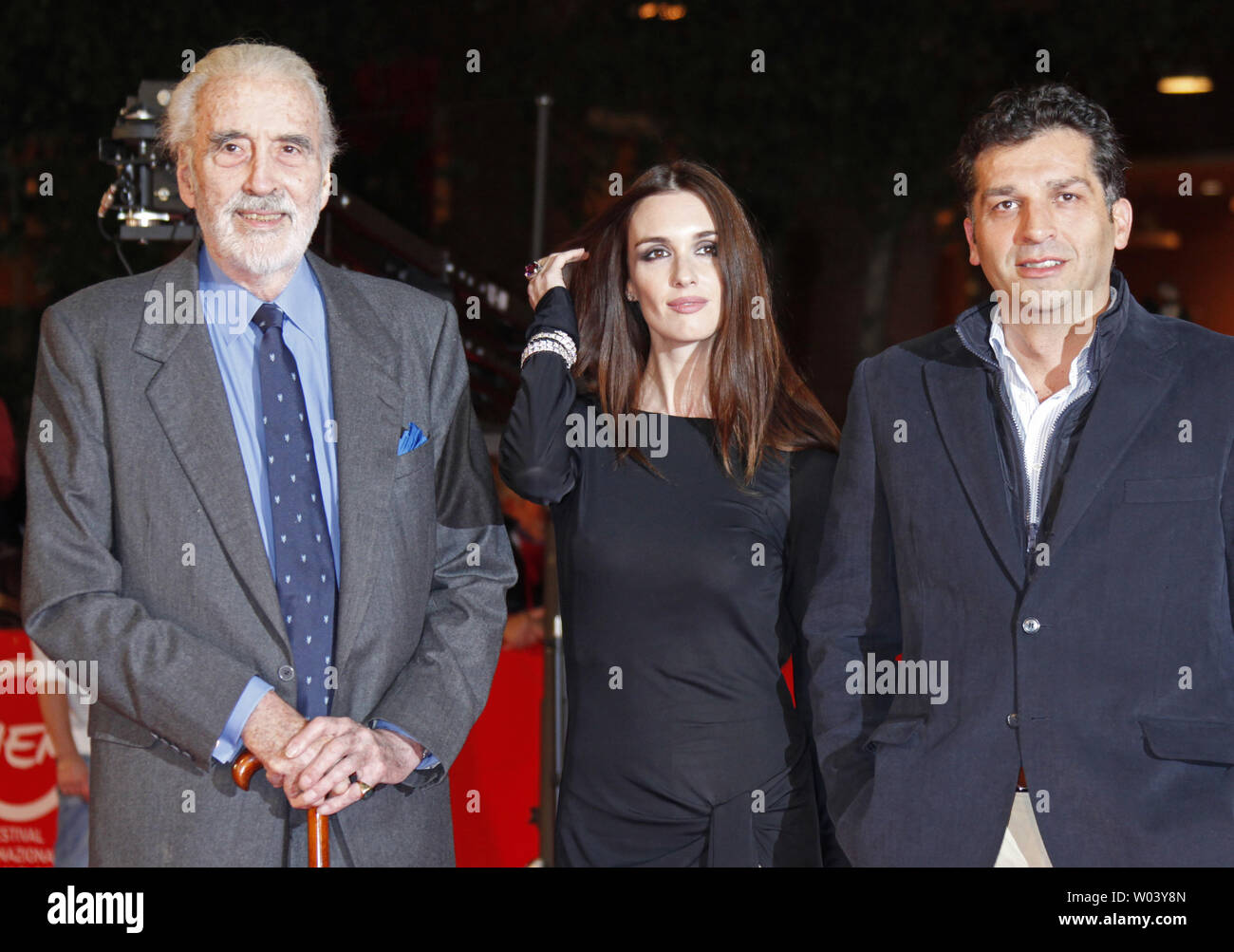 Christopher Lee (L), Paz Vega (C) and Danis Tanovic arrive on the red ...