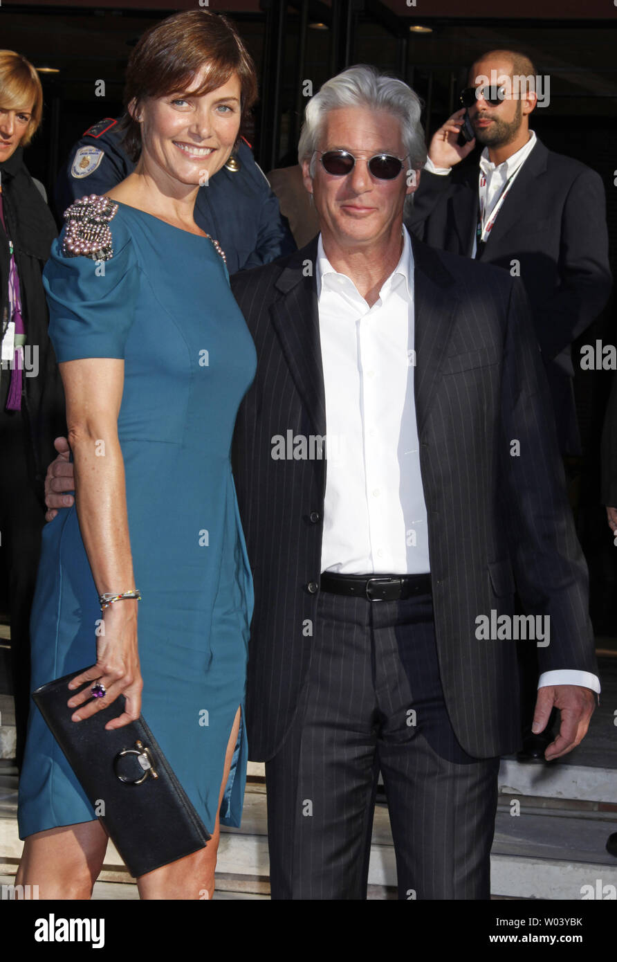 Richard Gere and his wife Carey Lowell arrive on the red carpet before ...