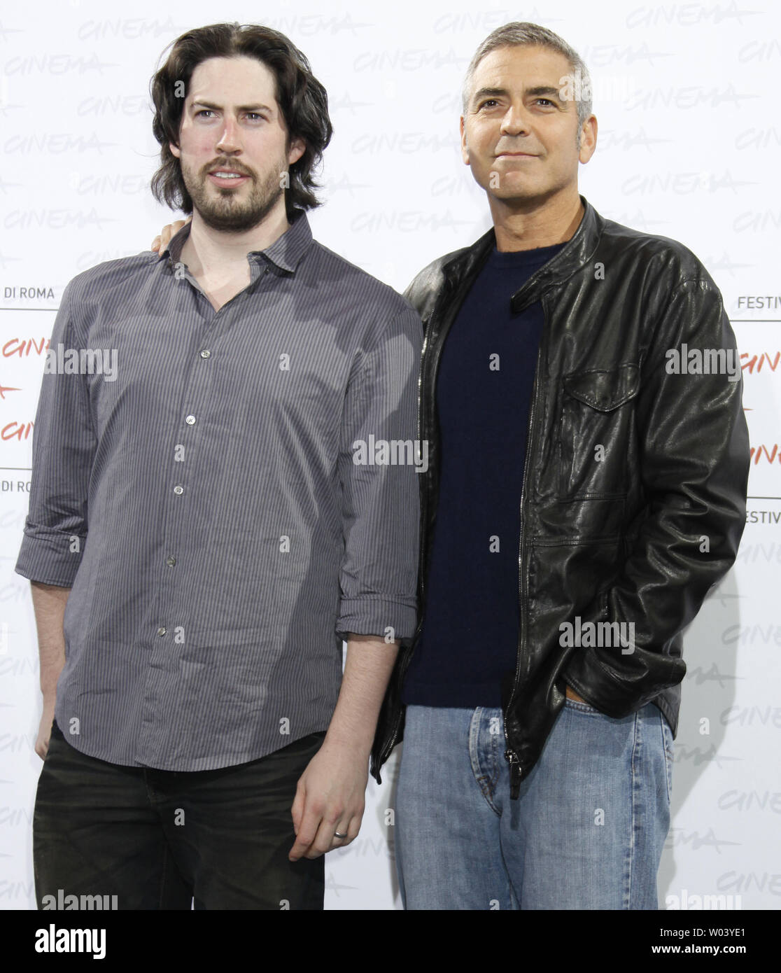George Clooney (R) and Jason Reitman arrive at a photocall for the film ...