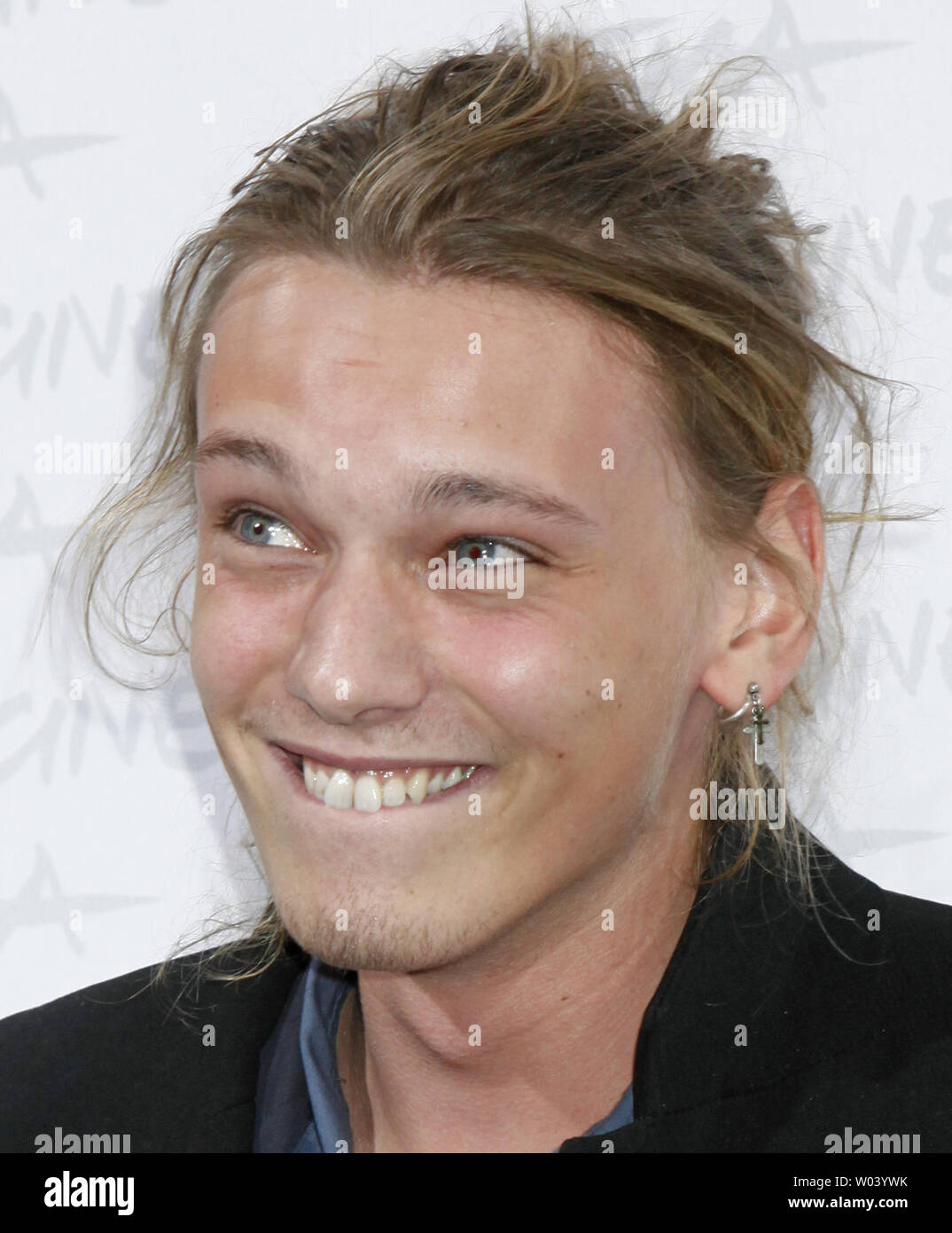 Jamie Campbell Bower arrives at a photocall for the film "The Twilight ...