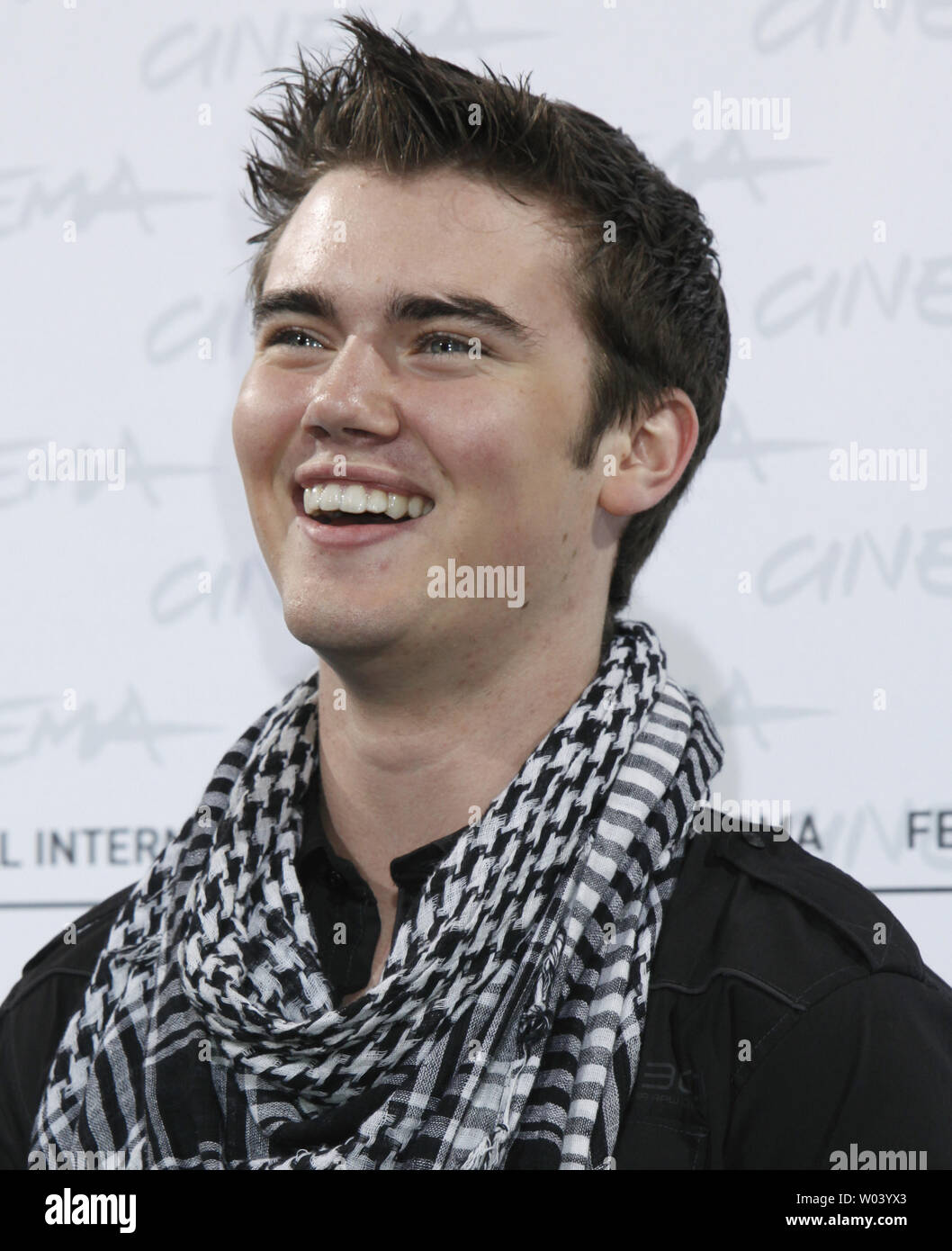Cameron Bright arrives at a photocall for the film "The Twilight Saga ...