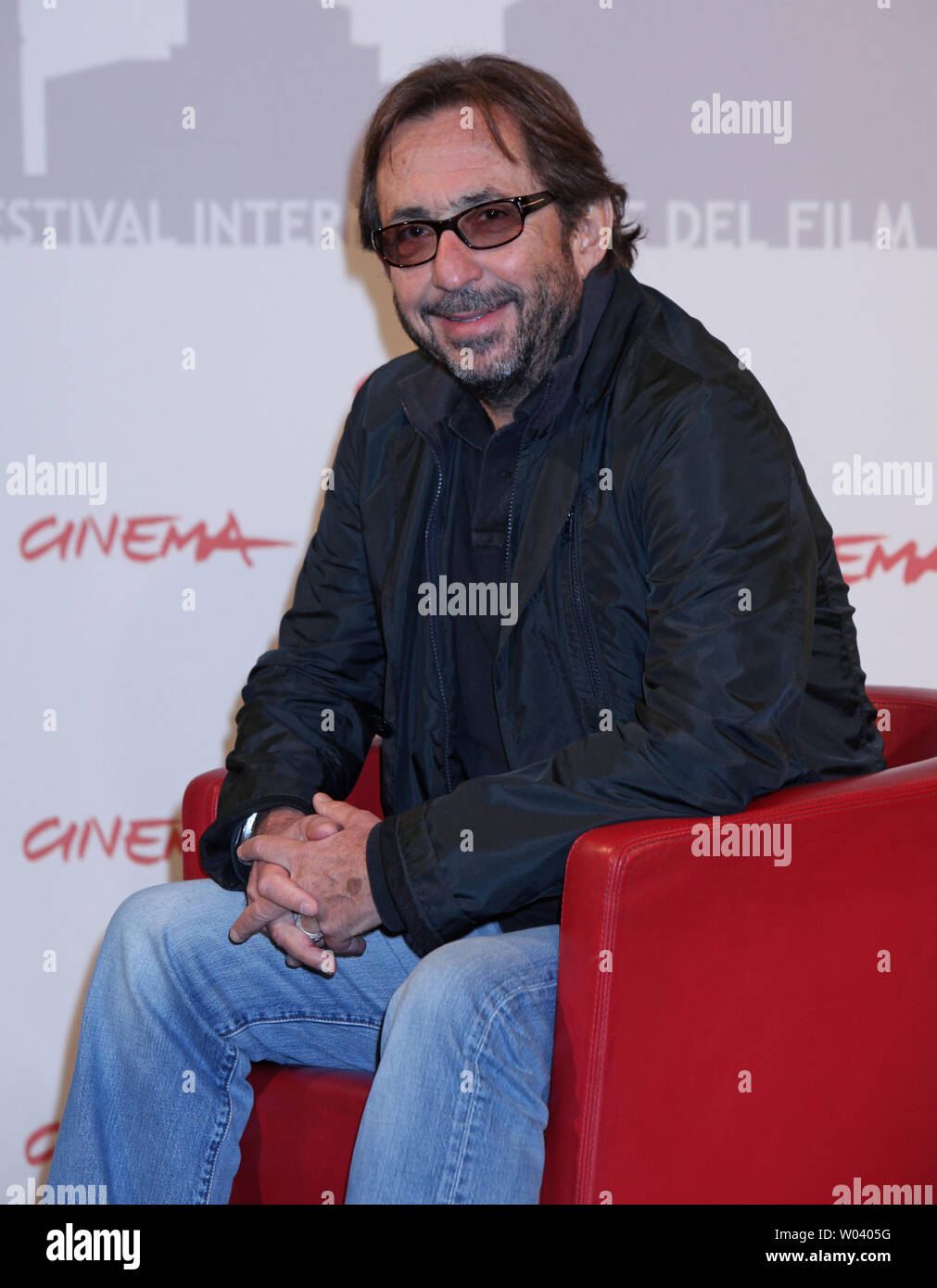 Sam Garbarski arrives at a photocall for the film "Quartier Lointain ...