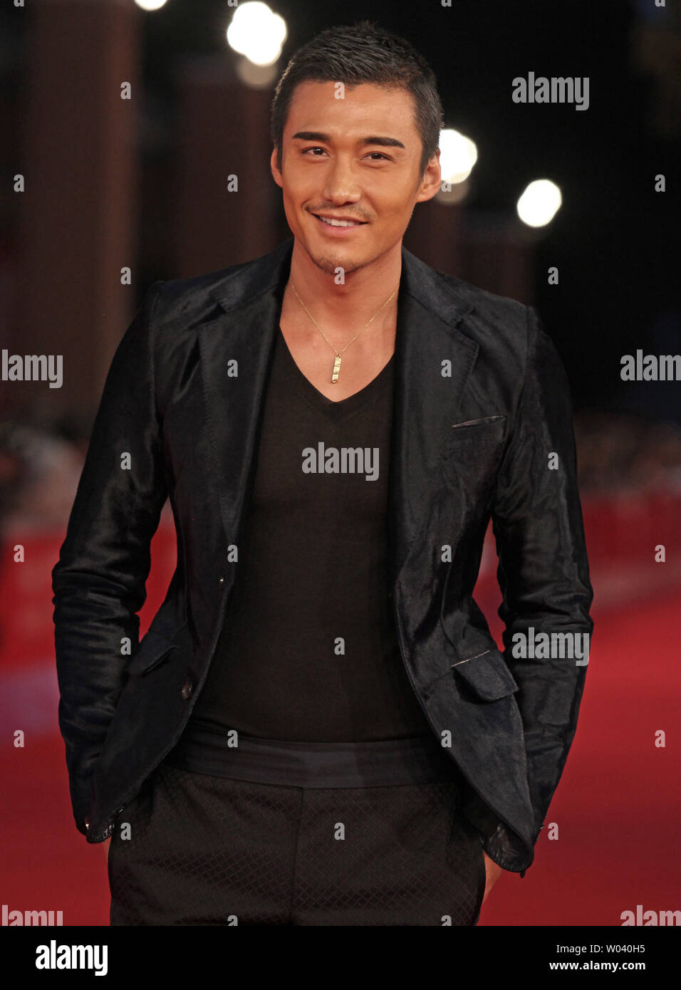 Hu Bing arrives on the red carpet before the screening of a digitally ...