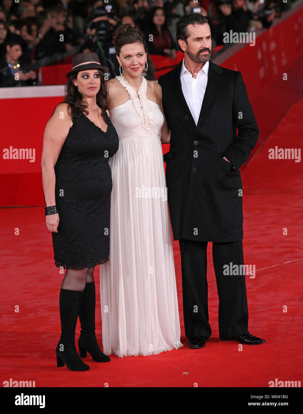 Tanya Wexler (L), Maggie Gyllenhaal (C) and Rupert Everett arrive on ...