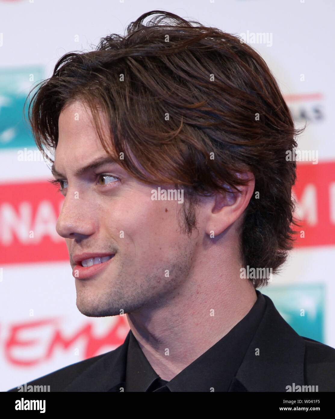 Jackson Rathbone arrives at a photocall for the film "The Twilight Saga ...