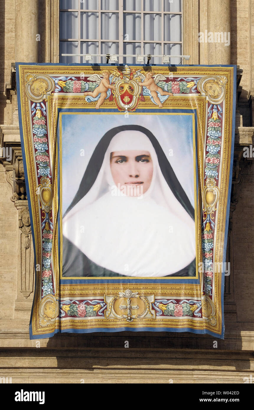 The tapestry of Maria Anna Cope hangs on St. Peter's Basilica during a ...