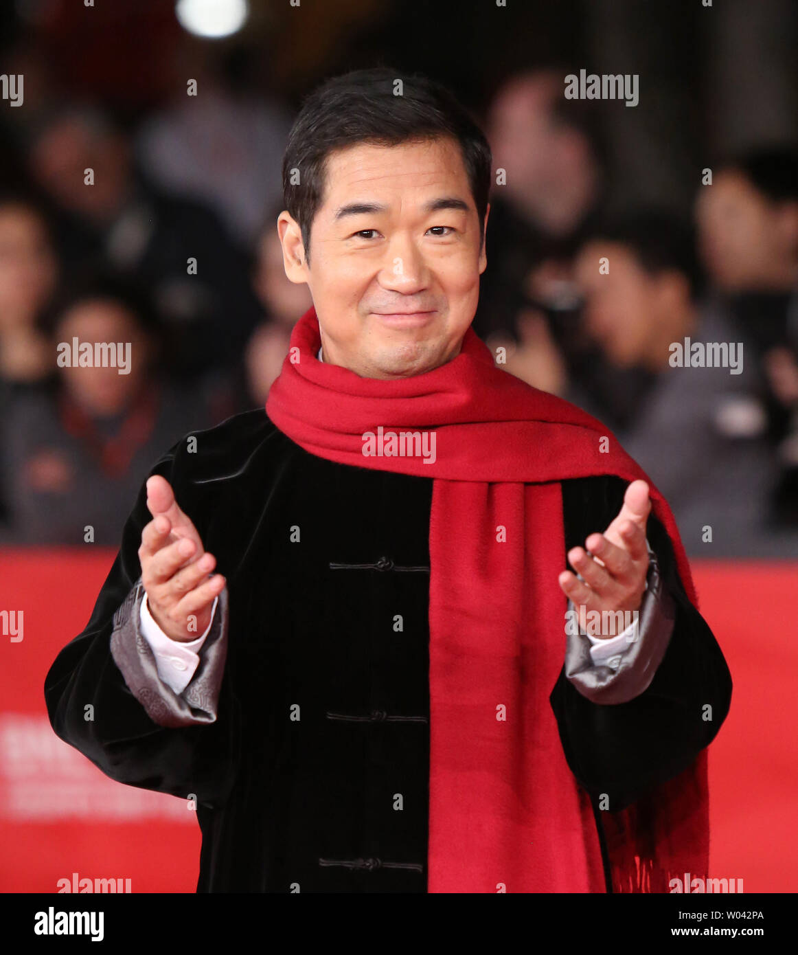Zhang Guo Li arrives on the red carpet during the opening of the 7th ...