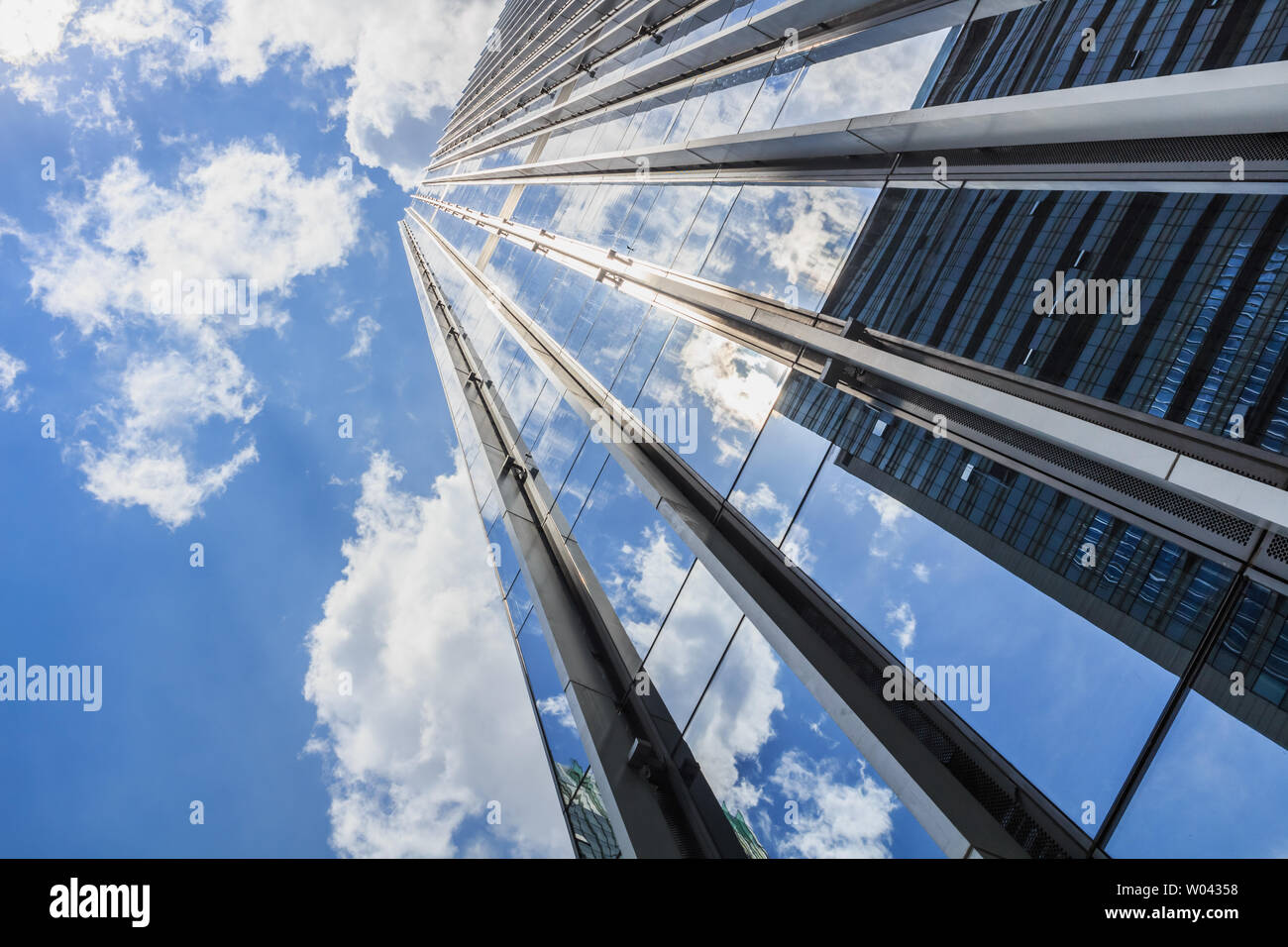 The city of high-rise building under the blue sky and white clouds ...